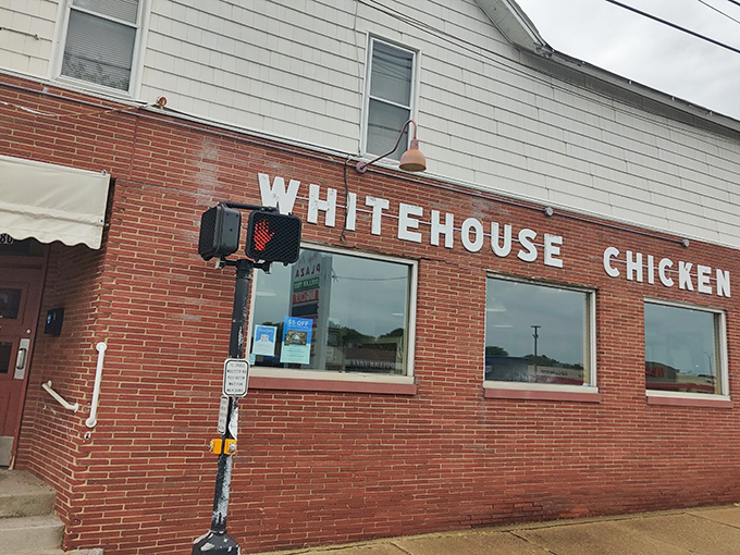 The unassuming brick exterior of White House Chicken in Barberton - proof that culinary greatness often hides behind the simplest facades.