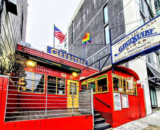 Like a neon-lit time machine on Pine Street, Grubstake's converted railway car promises late-night salvation for hungry souls until 4 AM.