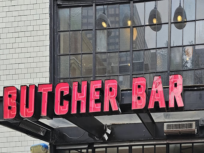That glowing red sign isn't just a logo&mdash;it's a beacon for meat lovers, promising carnivorous delights within those white-tiled walls.