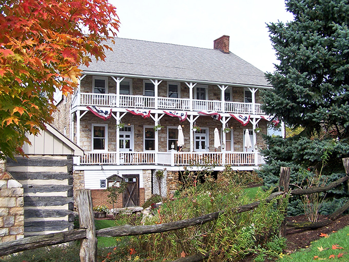 History stands proudly in stone at Jean Bonnet Tavern, where autumn's fiery maples frame this colonial gem like nature's own Instagram filter.