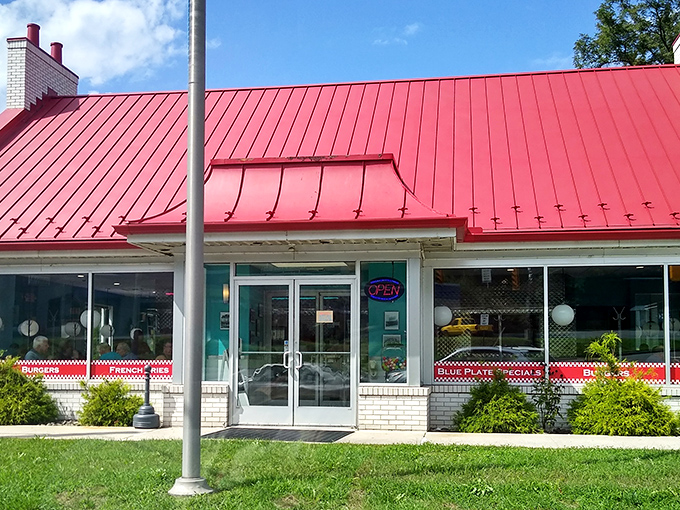 The white brick fortress of flavor stands proudly with its distinctive red trim, beckoning hungry travelers with the promise of comfort food paradise.