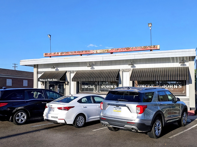 The unassuming exterior of Uncle John's Pancake House hides a breakfast paradise within. Like finding a treasure chest disguised as a shoebox.