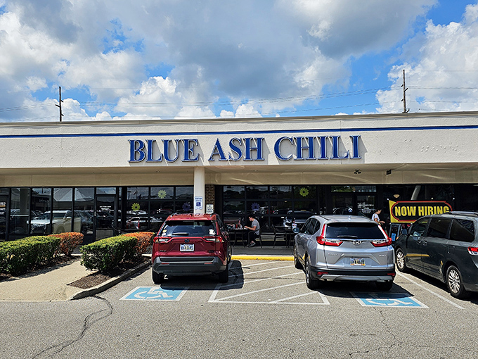 The unassuming strip mall exterior of Blue Ash Chili hides culinary treasures that have made it a destination for chili pilgrims nationwide.