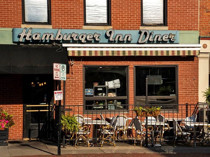 The classic neon sign beckons like an old friend, promising comfort food salvation on North Sandusky Street. Some architectural wonders feed the soul before you even step inside.