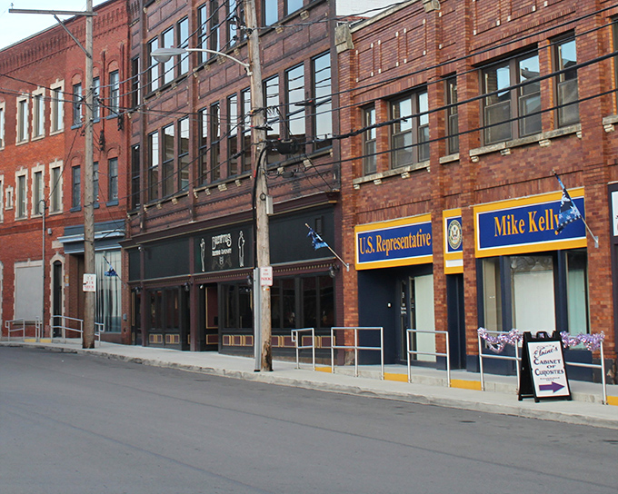 The brick facades whisper old stories, yet the air hums with small-town pride and possibility.