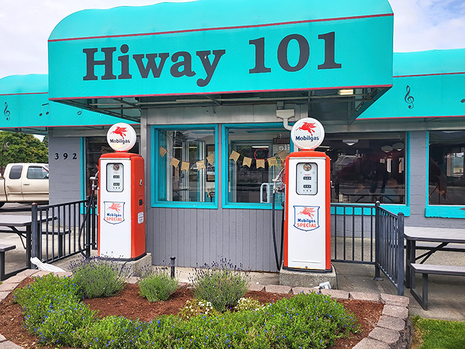 Those vintage Mobilgas pumps aren't functional, but they perfectly frame the entrance like time-travel portals to a more delicious decade.