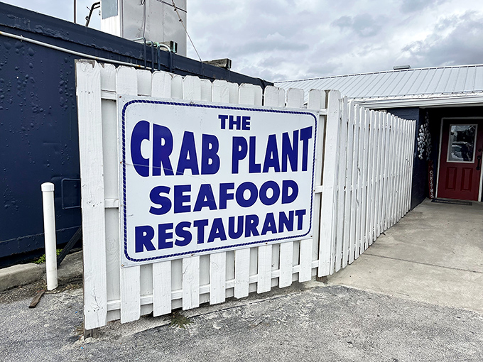 The white picket fence and bold blue lettering say it all &ndash; no pretense, just the promise of seafood that'll make you forget your table manners.