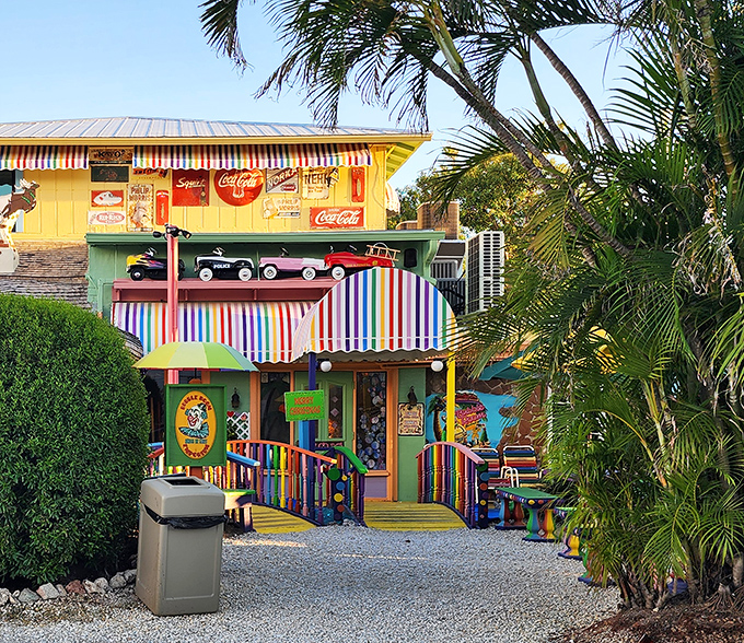 This rainbow-striped wonderland looks like Willy Wonka decided to open a beach restaurant with excellent taste in vintage signage.
