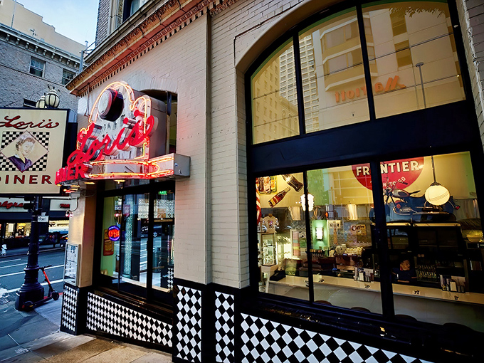Lori's Diner stands proudly on a San Francisco corner, its vintage neon sign beckoning hungry travelers like a lighthouse for comfort food enthusiasts.