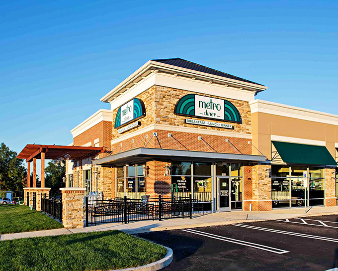 Metro Diner's inviting exterior promises comfort food paradise with its signature teal awning and stone-brick fa&ccedil;ade. Pennsylvania's answer to diner heaven awaits inside.