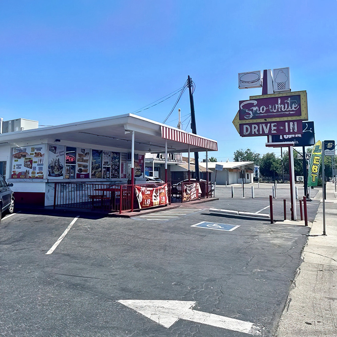 That iconic Sno-White sign against the blue California sky isn't just advertising&mdash;it's a time portal to when burgers were simple and sublime.