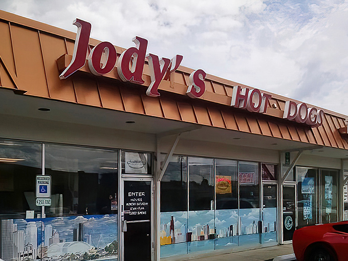 The unassuming storefront of Jody's Hot Dogs in Joliet&mdash;where culinary magic happens behind that Chicago skyline window decal.
