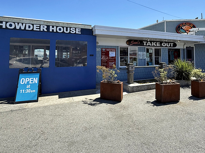 The iconic blue exterior of Sam's Chowder House stands like a beacon of seafood salvation on the Half Moon Bay coastline.