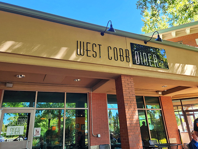 Bathed in golden sunlight, West Cobb Diner's entrance promises the kind of warm welcome that makes regular customers out of first-time visitors.