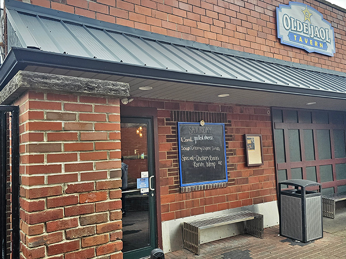 The brick exterior and wrought iron fencing hint at the building's past life as the Wayne County Jail, now serving sentences of delicious proportions.