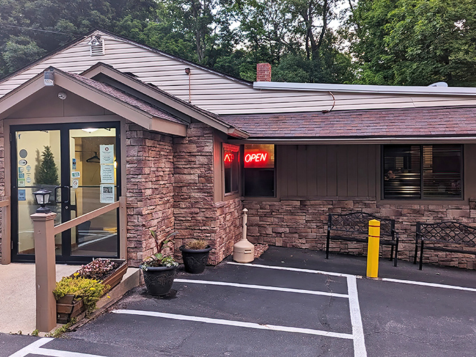 The stone facade and glowing "OPEN" sign create the perfect supper club welcome&mdash;like your favorite uncle inviting you in for the best meal of your life.