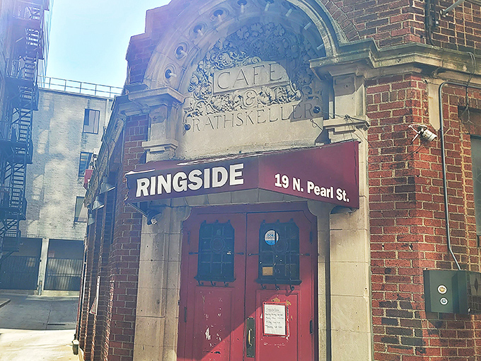 That iconic red door isn't just an entrance&mdash;it's a portal to burger paradise. The brick exterior whispers "historic," but screams "get in here now!"