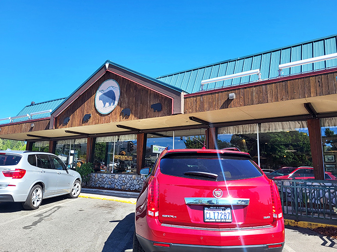 The rustic wooden exterior of Black Bear Diner stands like a welcoming mountain lodge, promising comfort food and hospitality beneath Mt. Shasta's watchful gaze.