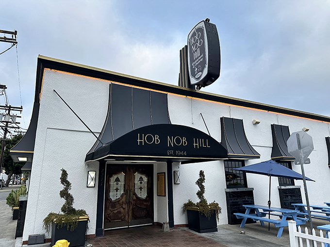 This charming blue-striped facade whispers promises of breakfast bliss that'll make your morning worthwhile.