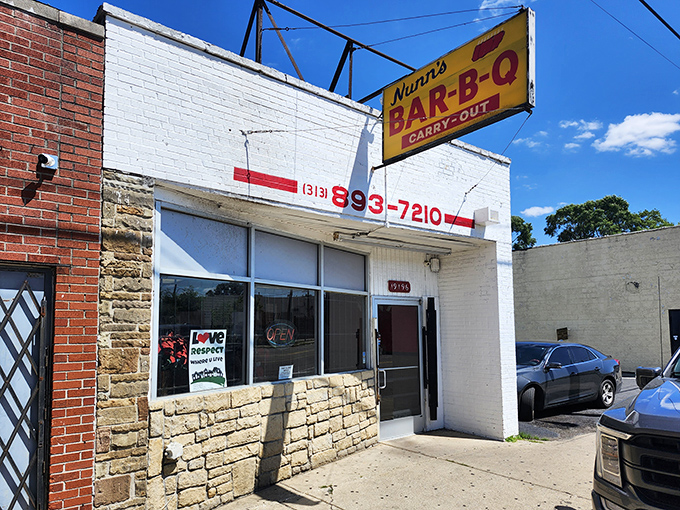 The iconic yellow and red sign beckons hungry travelers like a culinary lighthouse. Nunn's Bar-B-Que II doesn't need fancy frills when the food speaks this loudly