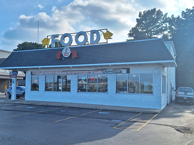 The humble roadside exterior of Cozy Dog Drive In belies its legendary status. This unassuming building on Route 66 has been making Illinois stomachs happy for generations.