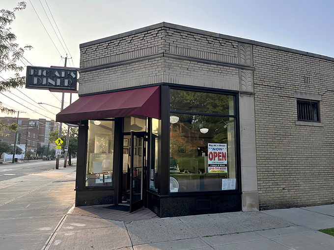 The classic brick exterior with that iconic red awning isn't trying to impress anyone&mdash;it's saving all its energy for what matters: the food inside.