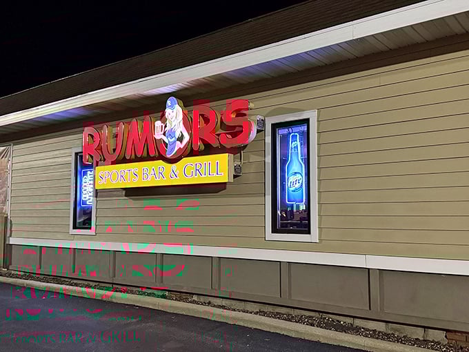 That iconic red sign glows like a beacon in the night, drawing in locals who know that behind those walls lies fish fry perfection.
