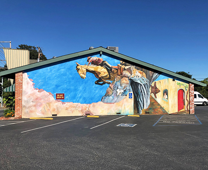 The cowboy mural leaping across this Santa Cruz diner's exterior isn't just decoration&mdash;it's a promise of the wild west of flavor waiting inside.