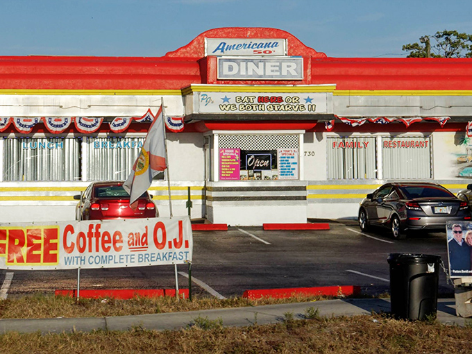 The rainbow-colored exterior of Americana 50's Diner stands out like a Technicolor dream against Florida's blue sky, promising nostalgic delights within.