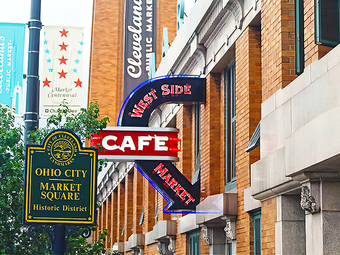 The iconic neon sign beckons hungry travelers like a culinary lighthouse in Cleveland's historic Ohio City Market Square district.