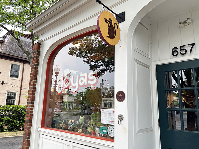 The unassuming storefront that houses culinary greatness. Like finding a Picasso at a yard sale, Joya's monkey logo signals you've discovered something special.