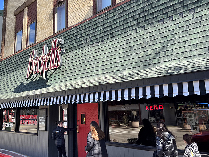 The iconic red Beckett's sign welcomes hungry pilgrims to this Bowling Green institution. Like a burger bat signal for your appetite!