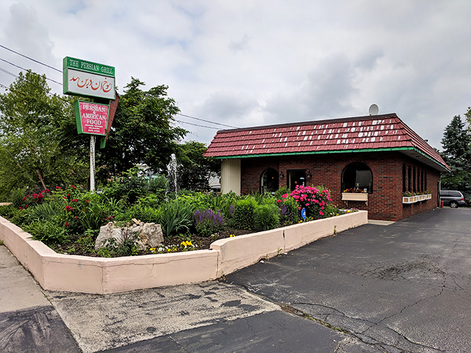 The unassuming brick exterior with its distinctive red-tiled roof hides culinary treasures within. Like finding a Persian palace in suburban Pennsylvania.