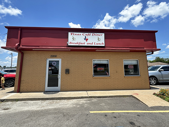 The unassuming brick exterior with its bold red trim promises what every great Texas diner should: honest food without the fuss.