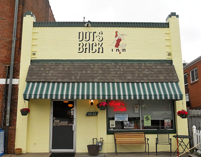The unassuming exterior of Dot's Back Inn beckons like an old friend, promising comfort food treasures within its brick walls.
