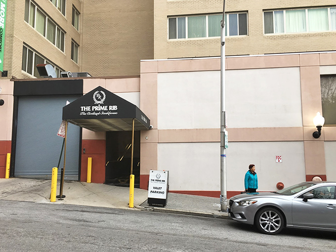 The unassuming entrance belies what awaits inside. Like finding a secret passage to carnivore heaven, this modest awning marks the spot where meat dreams come true.