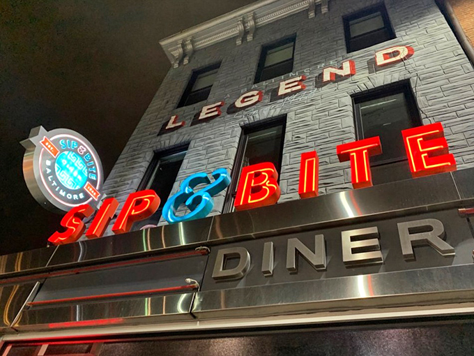 The classic stainless steel exterior of Sip & Bite stands as a shining beacon of comfort food in Baltimore's Canton neighborhood.