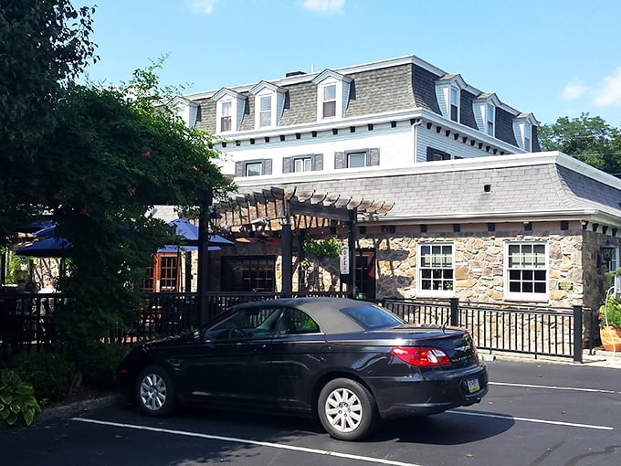 From another angle, the tavern's charming pergola and outdoor seating area promise al fresco dining possibilities when Pennsylvania weather cooperates.