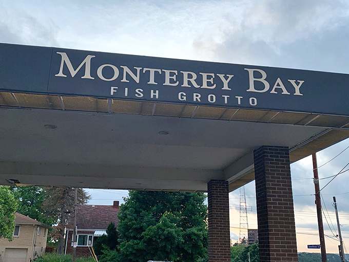 The entrance beckons like a portal to seafood paradise. Monterey Bay Fish Grotto's unassuming exterior hides the culinary treasures waiting inside.