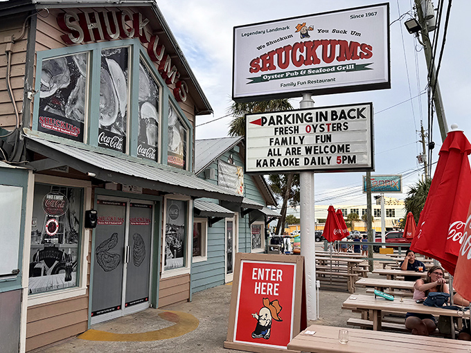 The weathered exterior of Shuckums screams "authentic seafood joint" louder than a seagull eyeing your french fries. This is Florida's coastal charm personified.