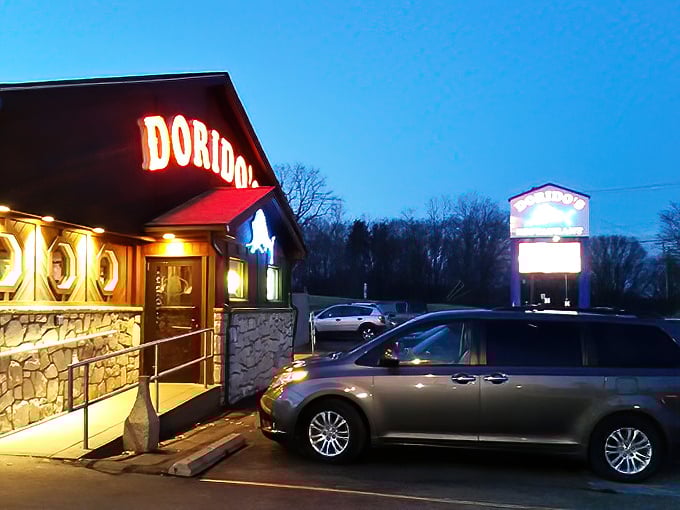 As night falls, Dorido's red sign glows like a lighthouse beacon, guiding hungry travelers to a safe harbor of culinary delights.
