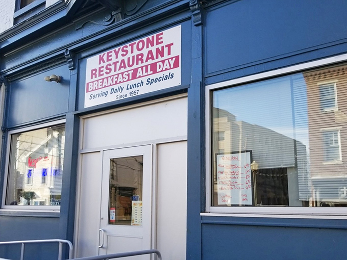 The blue facade of Keystone Restaurant stands like a beacon of breakfast hope in Harrisburg, promising "BREAKFAST ALL DAY" &ndash; four words that should be on Pennsylvania's state flag.