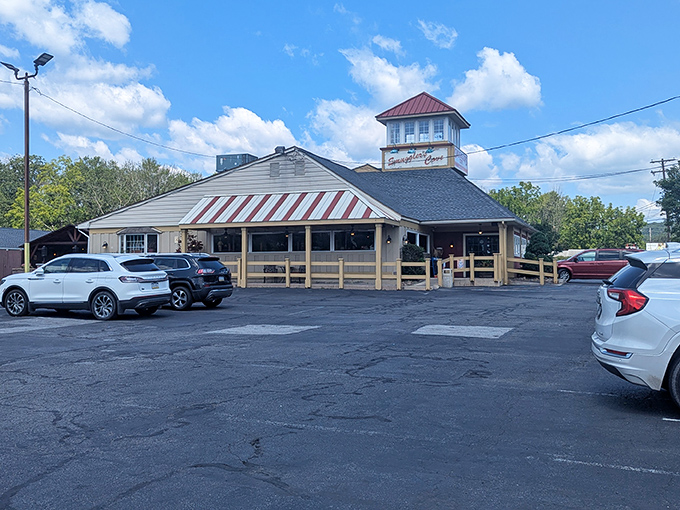 The cheerful red and yellow exterior of Smuggler's Cove stands like a beacon of culinary promise in Tannersville, welcoming hungry travelers with nautical charm.