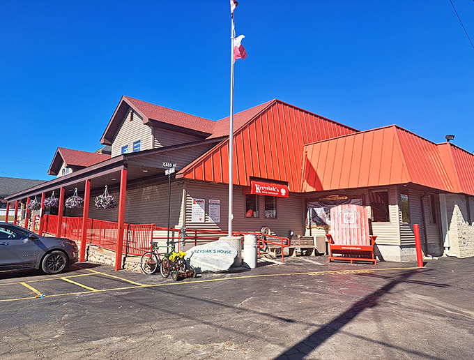The iconic red-roofed exterior of Krzysiak's stands like a beacon of comfort food promise in Bay City, where Polish tradition meets Midwestern hospitality.