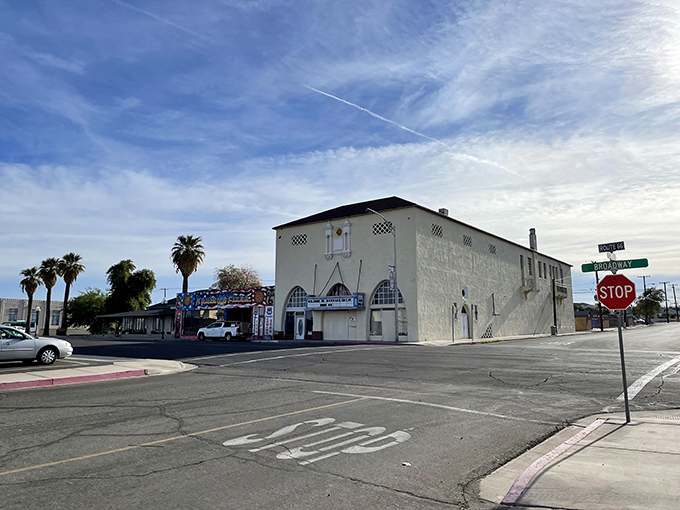 The historic El Garces building stands under Needles' vast blue sky, where affordable retirement meets small-town charm.