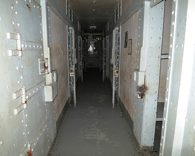 The long corridor of steel and silence &ndash; where every footstep echoes with stories of those who walked this path before you.