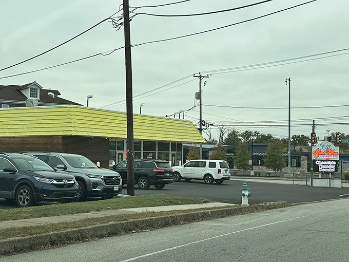 Even on overcast days, that yellow roof brightens the landscape, drawing donut pilgrims from across Montgomery County to its sweet sanctuary.