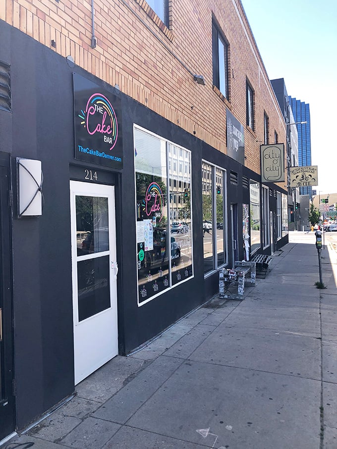 The unassuming brick exterior of The Cake Bar hides a colorful sugar paradise within. That neon sign is basically a bat signal for dessert lovers.