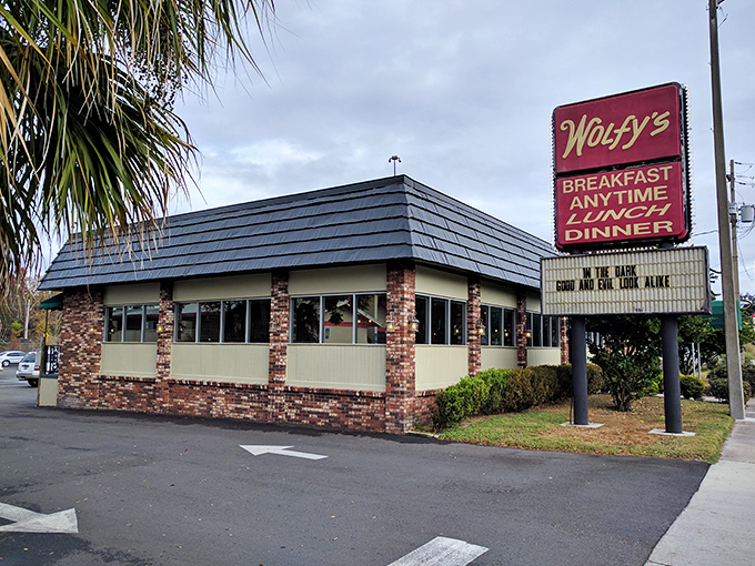 The brick-faced charm of Wolfy's exterior promises comfort before you even walk through the door. Florida's breakfast paradise hiding in plain sight.