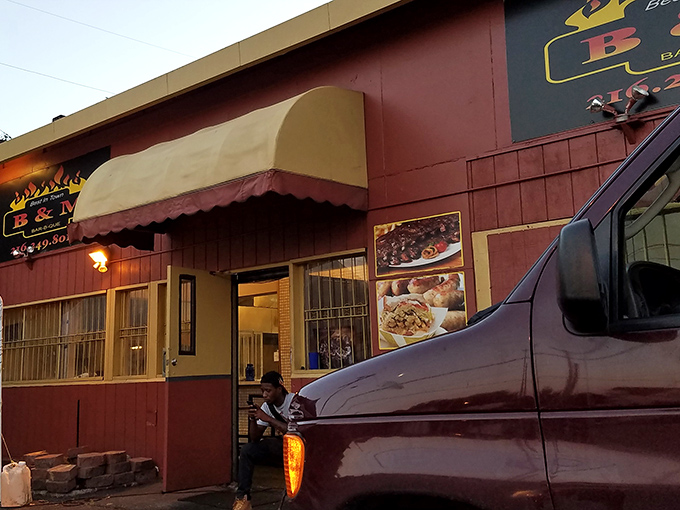 The unassuming burgundy exterior of B & M might not win architectural awards, but that smoky aroma wafting from inside? Pure Cleveland gold.